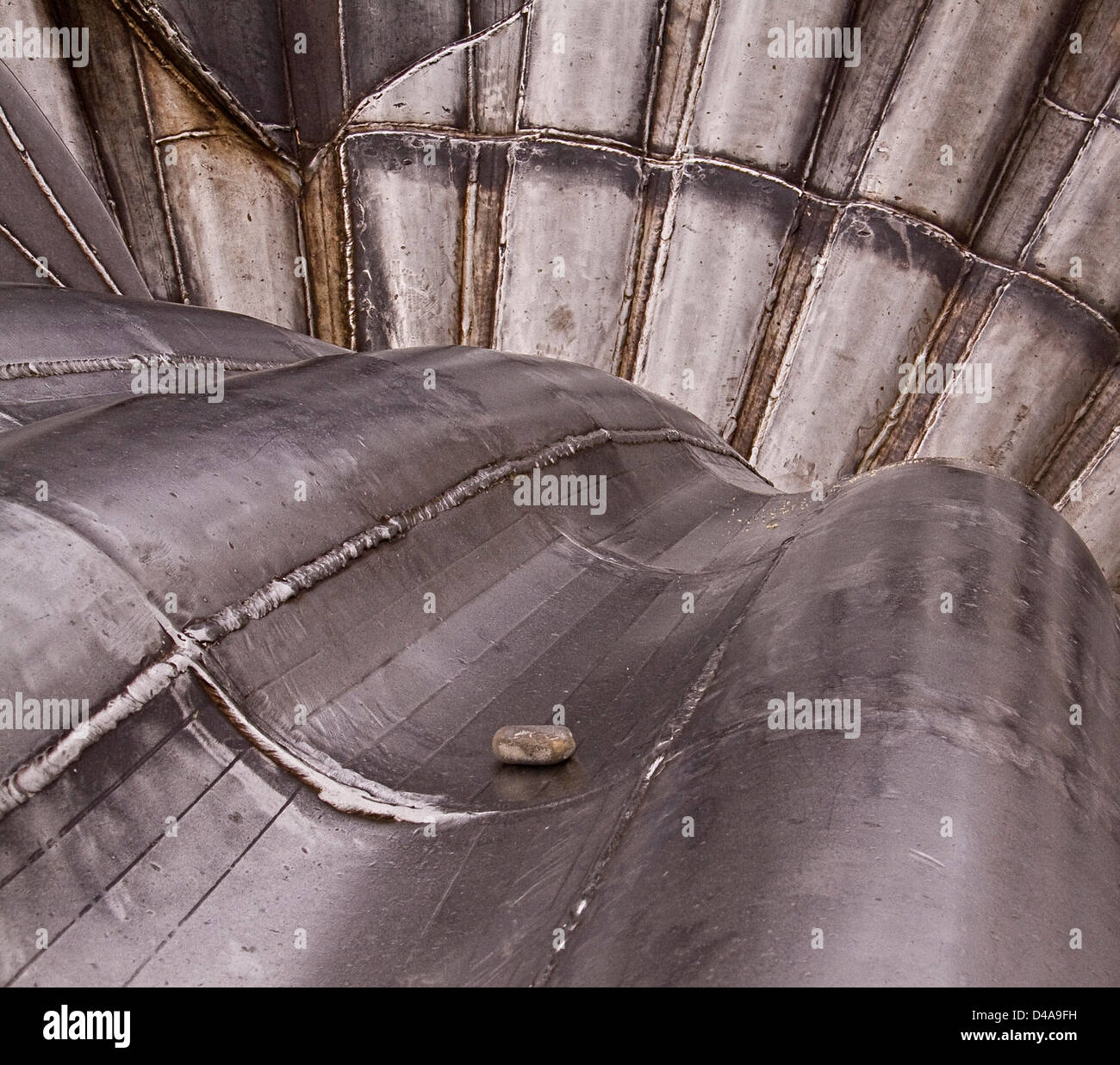 Stone on a Steel Sculpture Stock Photo - Alamy