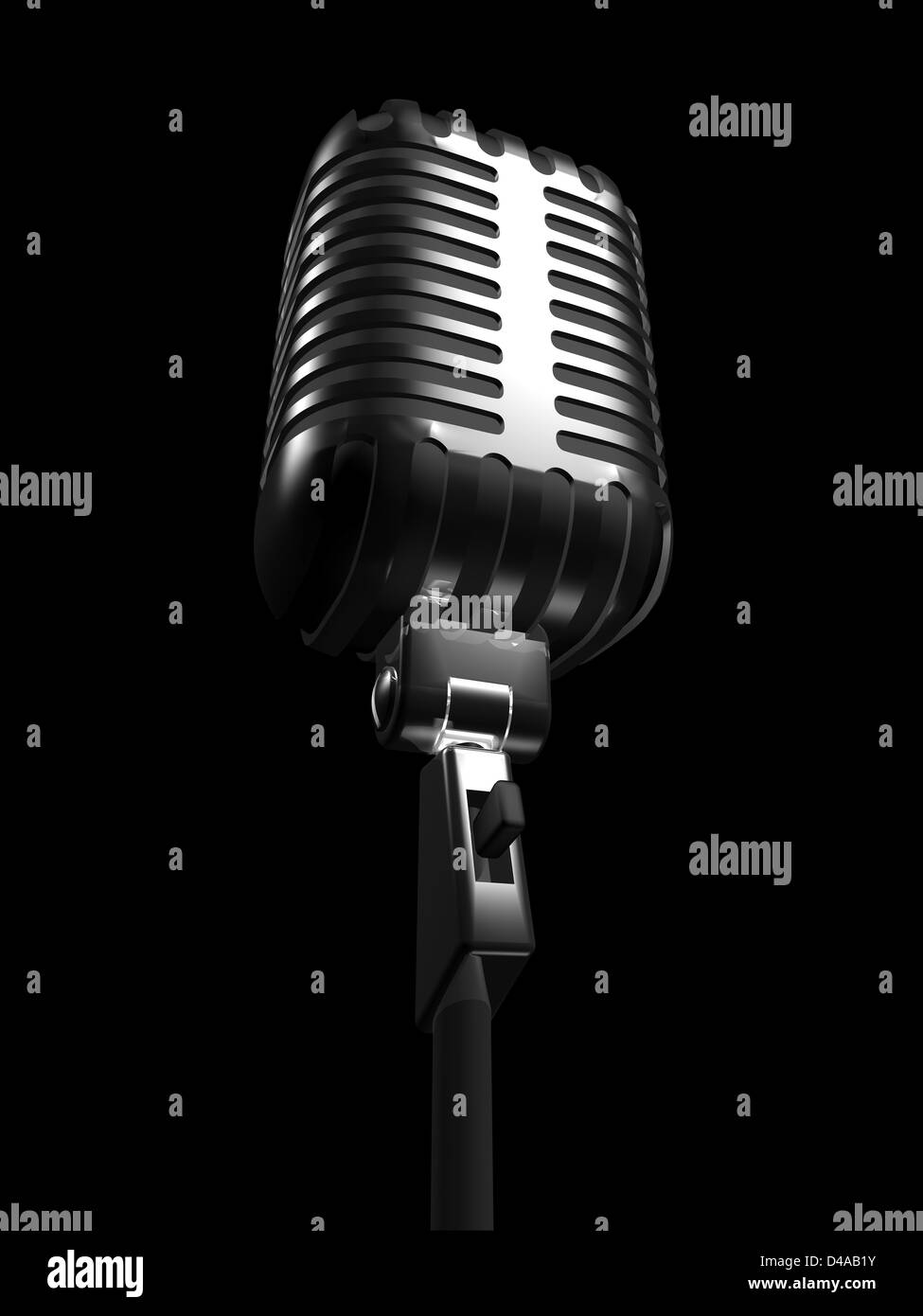 Old fashioned microphone against black background Stock Photo - Alamy