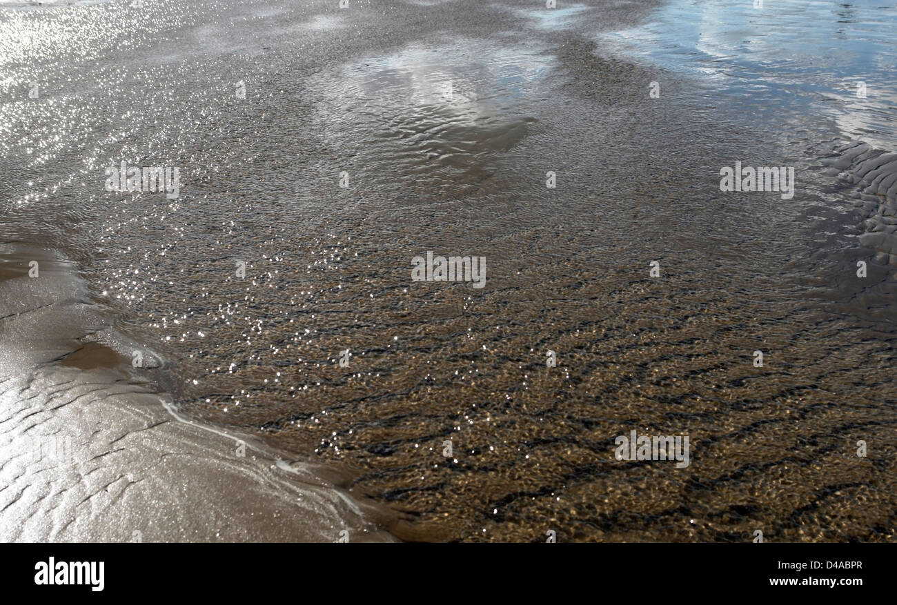 abstract beach scenery with water, sand and sky reflections Stock Photo ...