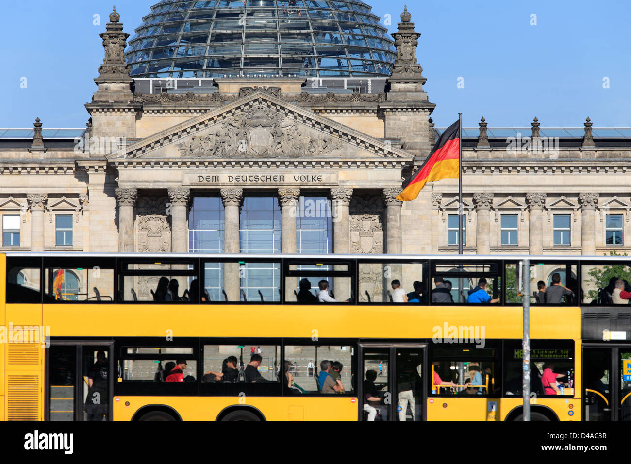 Berlin, Germany, one of the BVG bus drives past the Reichstag Stock ...