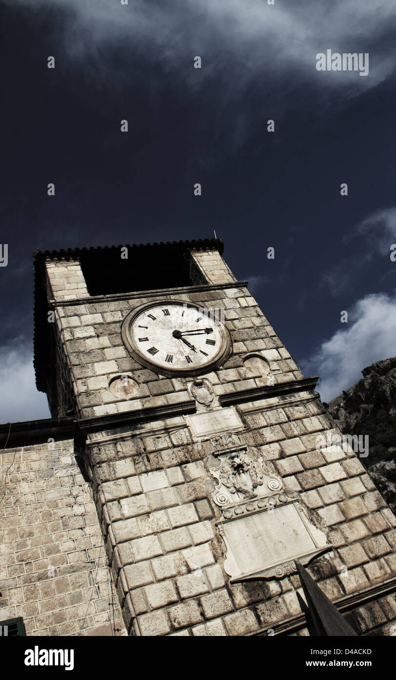 Ancient clock tower from old medieval town of Kotor, Montenegro Stock ...