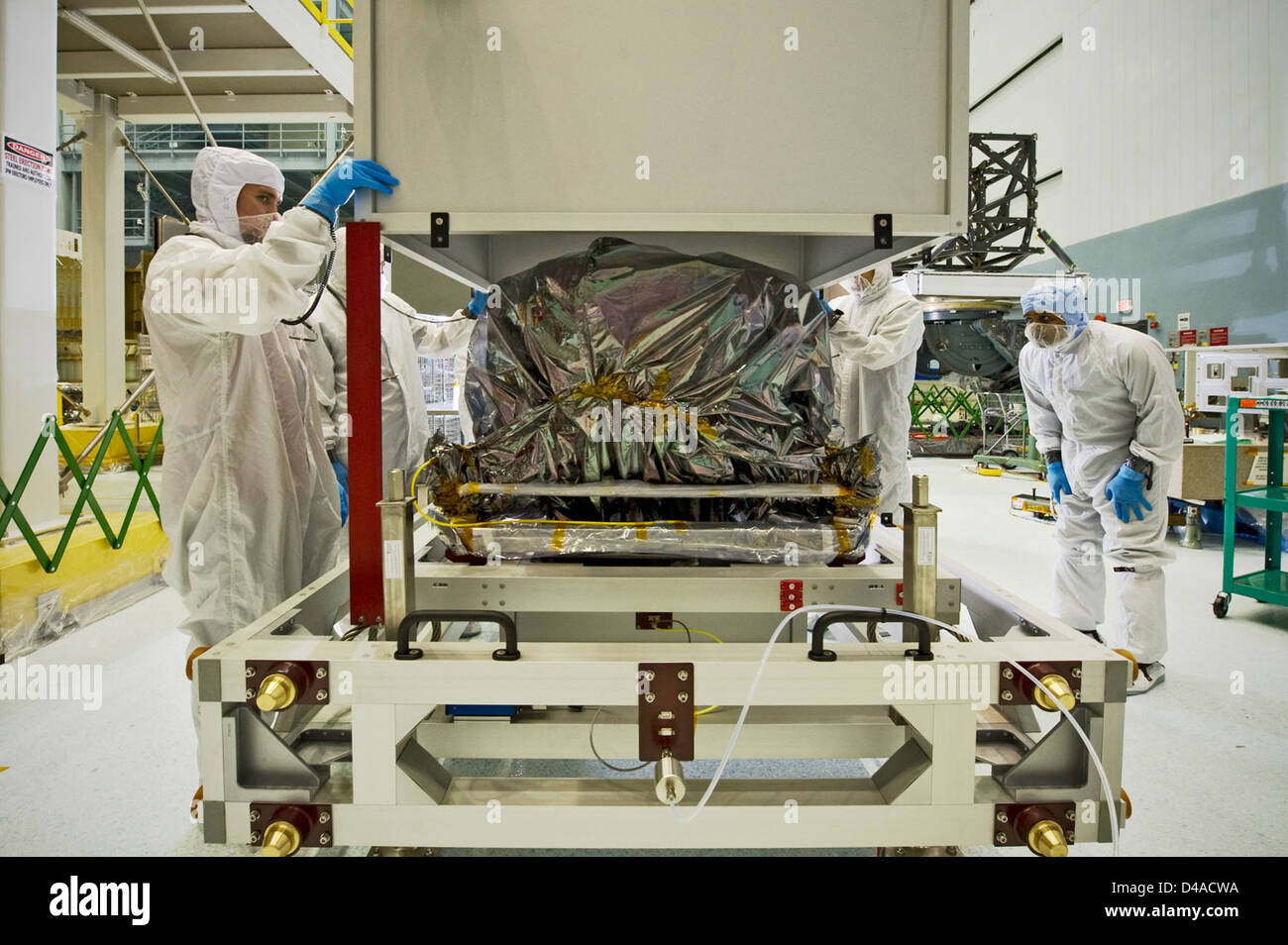NASA scientists uncrate the Mid-Infrared Instrument (MIRI) for the ...