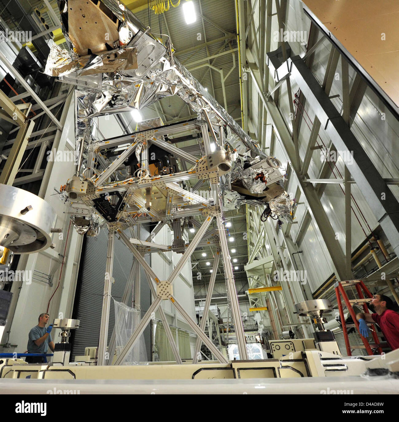 NASA’s Webb Telescope test component, supported by a complex structure ...