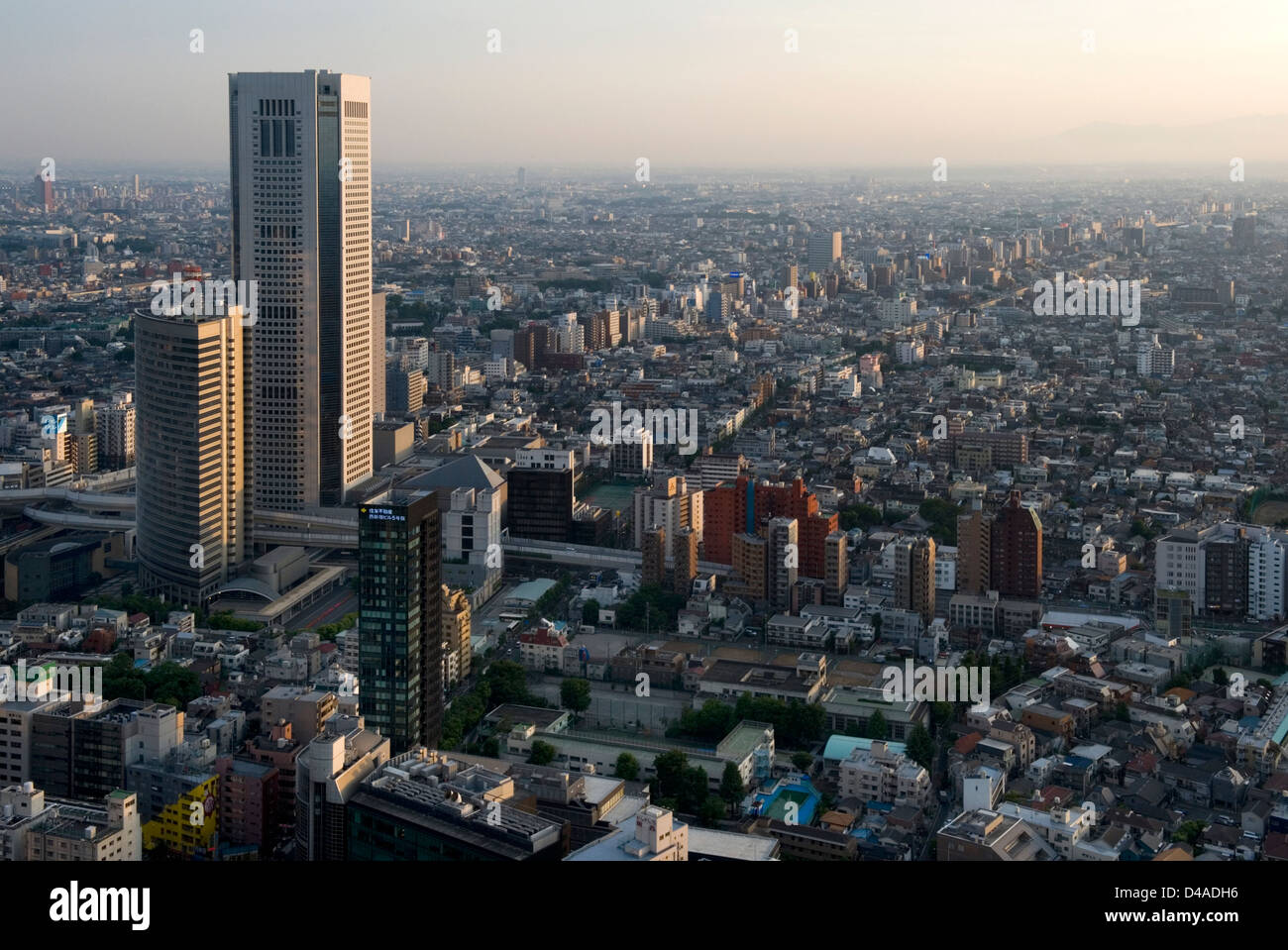 Aerial view of downtown Tokyo city skyline with skyscraper high-rise buildings and urban sprawl ...