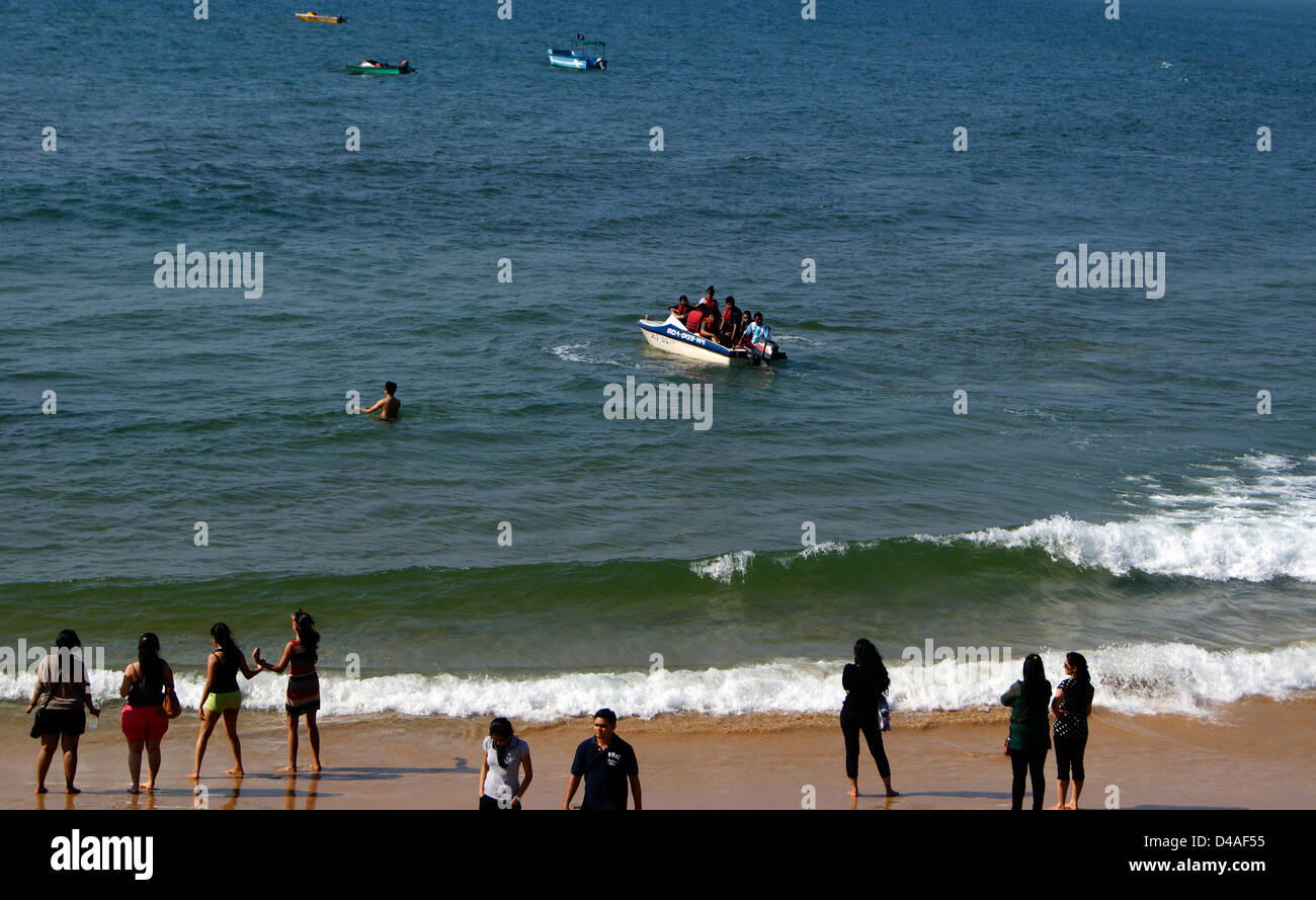 Goa Beach India and Goa Beach Boats and Tourists Stock Photo - Alamy