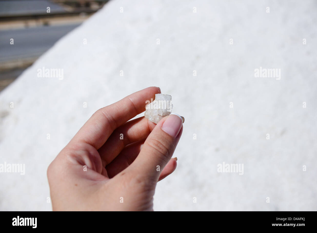 Hand holding salt hi-res stock photography and images - Alamy