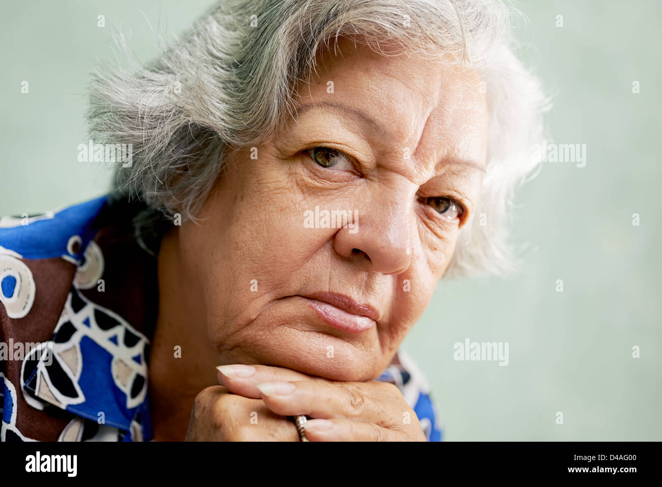 Elderly hispanic woman sad hi-res stock photography and images - Alamy