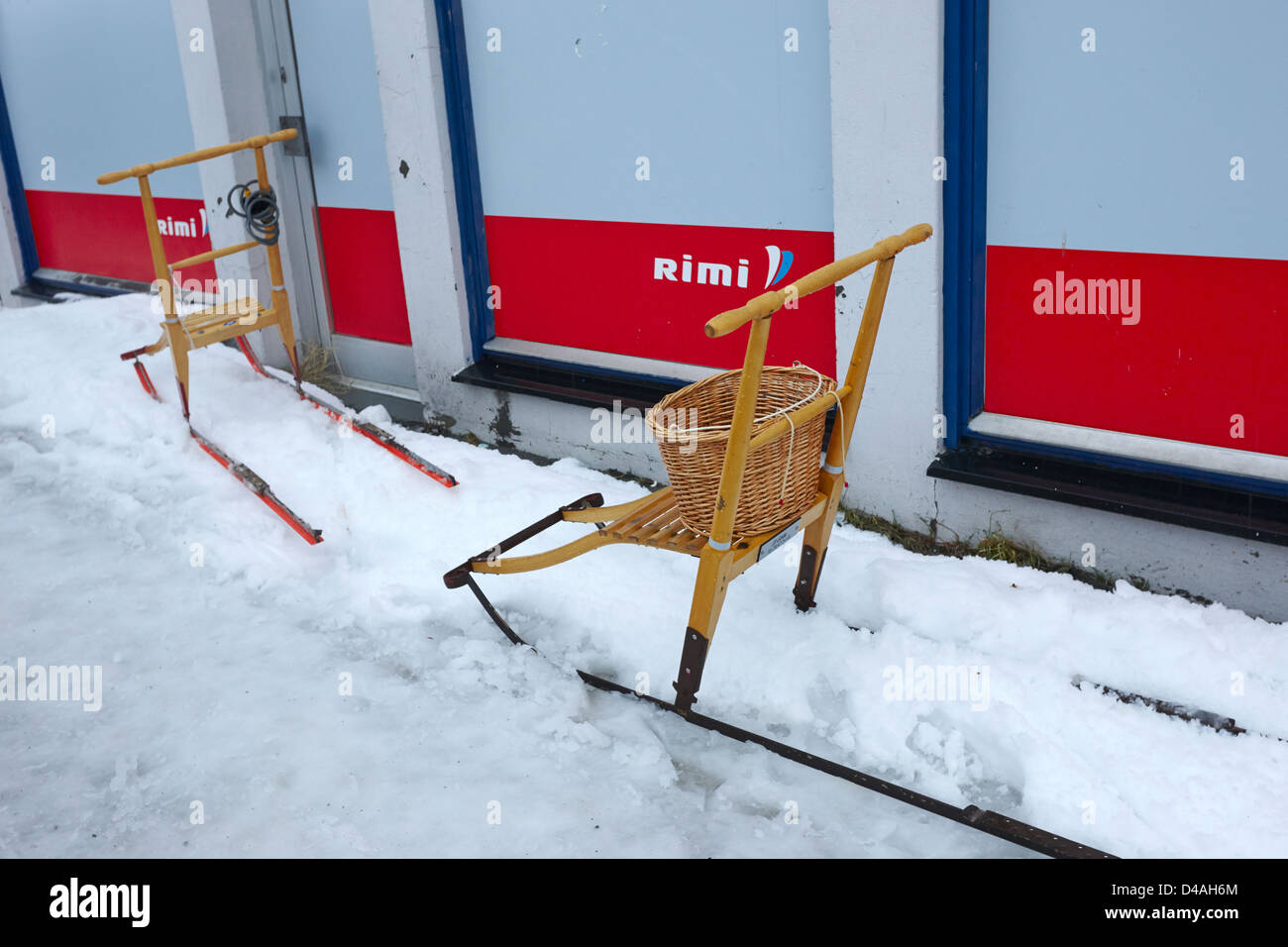 kicksleds outside a supermarket norway europe Stock Photo - Alamy