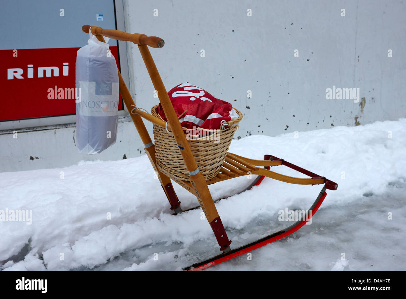 kicksled outside a supermarket norway europe Stock Photo - Alamy