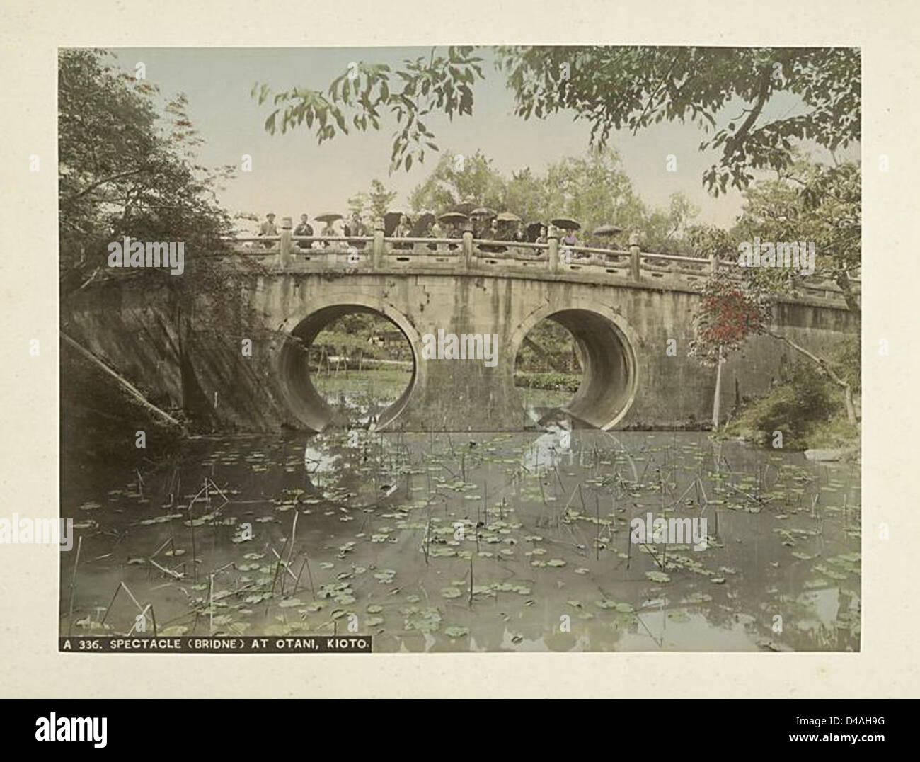 This image depicts the Otani Bridge in Kyoto, Japan. The bridge is a ...