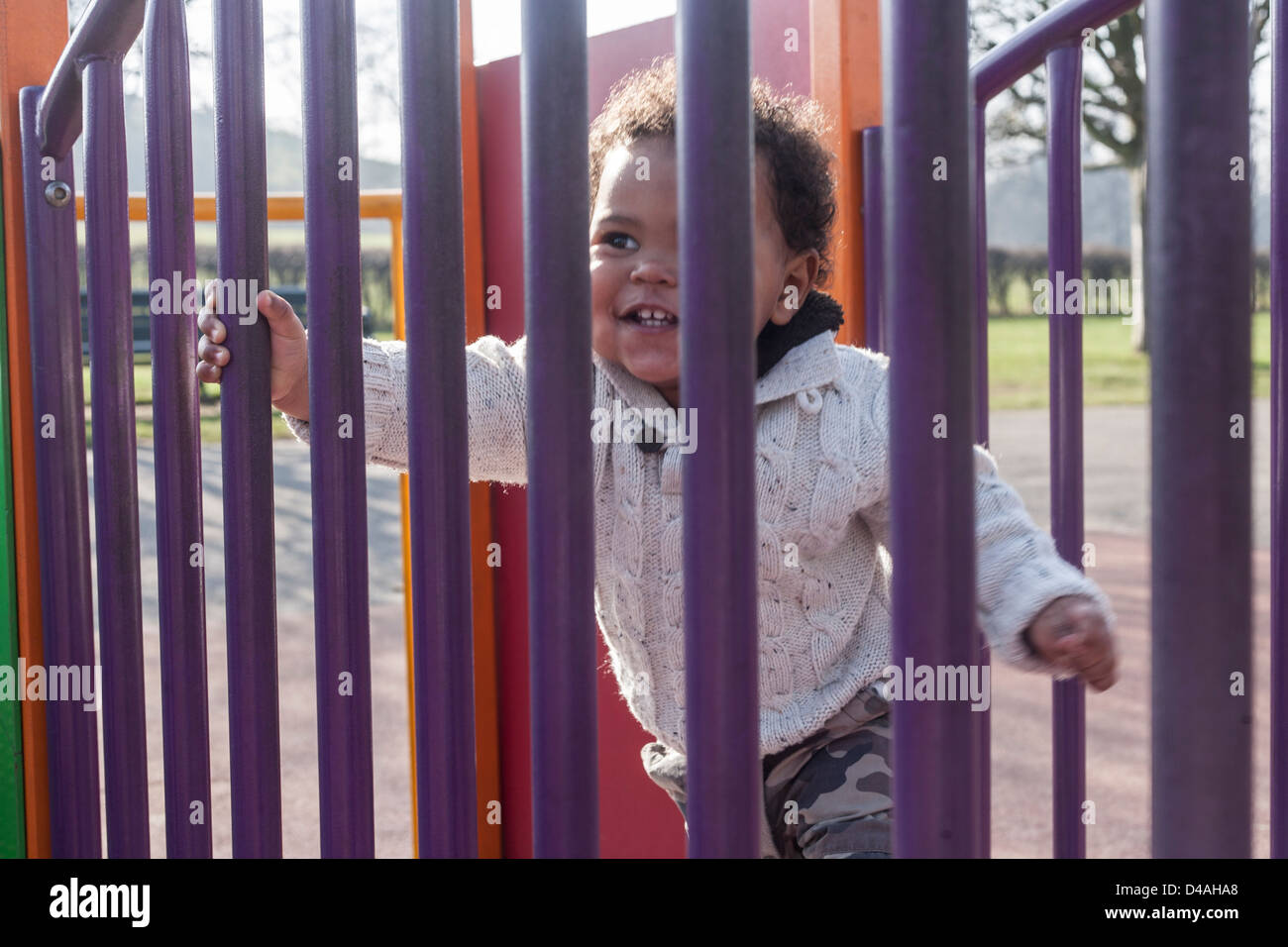 Boy Climbing Fence Stock Photos & Boy Climbing Fence Stock Images - Alamy
