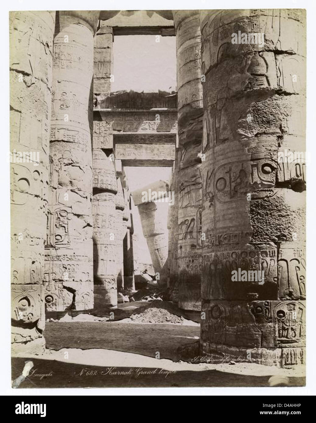 The image shows the grand interior of the Hypostyle Hall at Karnak ...