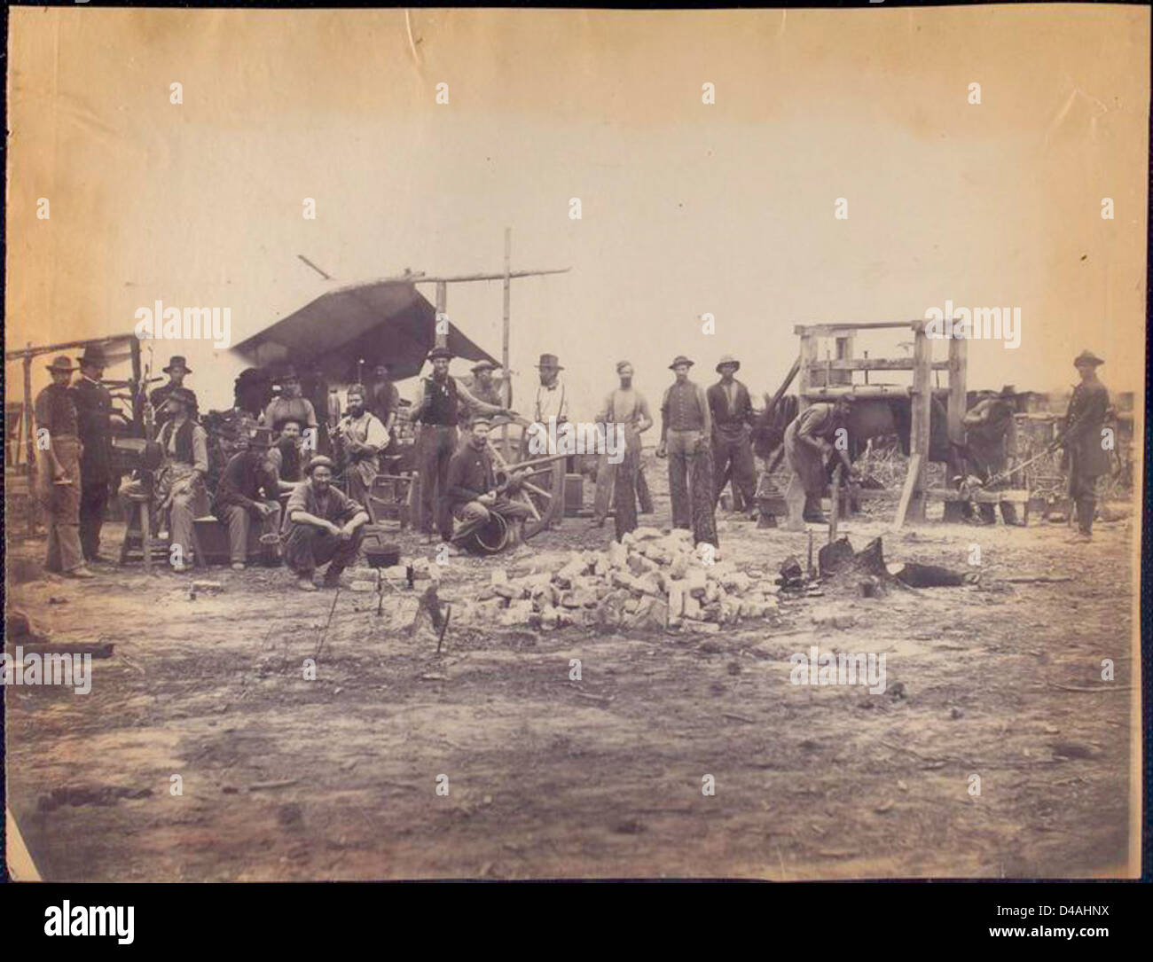 A photograph from 1865 showing an army repair shop during the Civil War ...