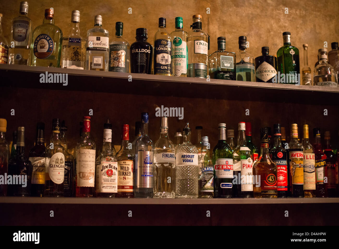 Multicolored bottles on shelves hi-res stock photography and images - Alamy