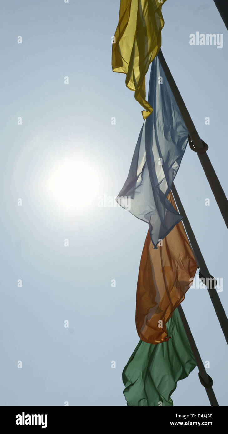 Many different colored flags in a bright clear blue sunny sky Stock ...