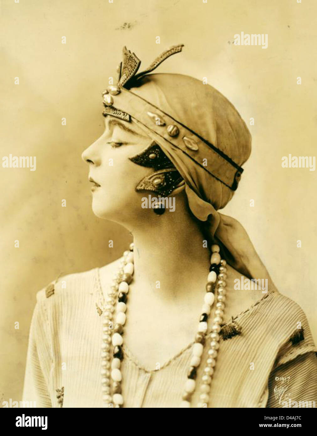 Ruth St. Denis is captured in a striking costume during the 1910s ...