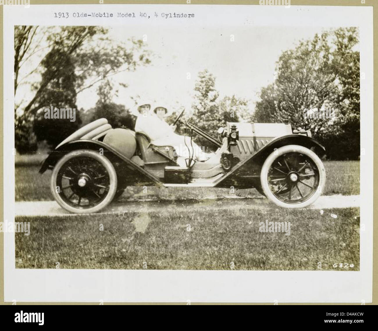 This 1913 photograph showcases the Oldsmobile Model 40, a four-cylinder ...