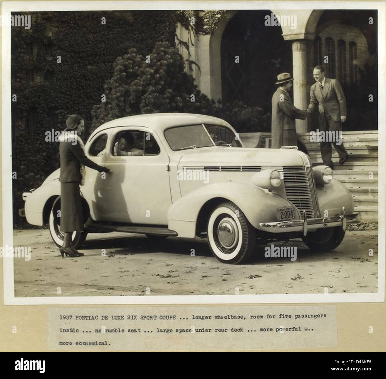 The 1937 Pontiac De Luxe Six Sport Coupe is a classic example of 1930s ...