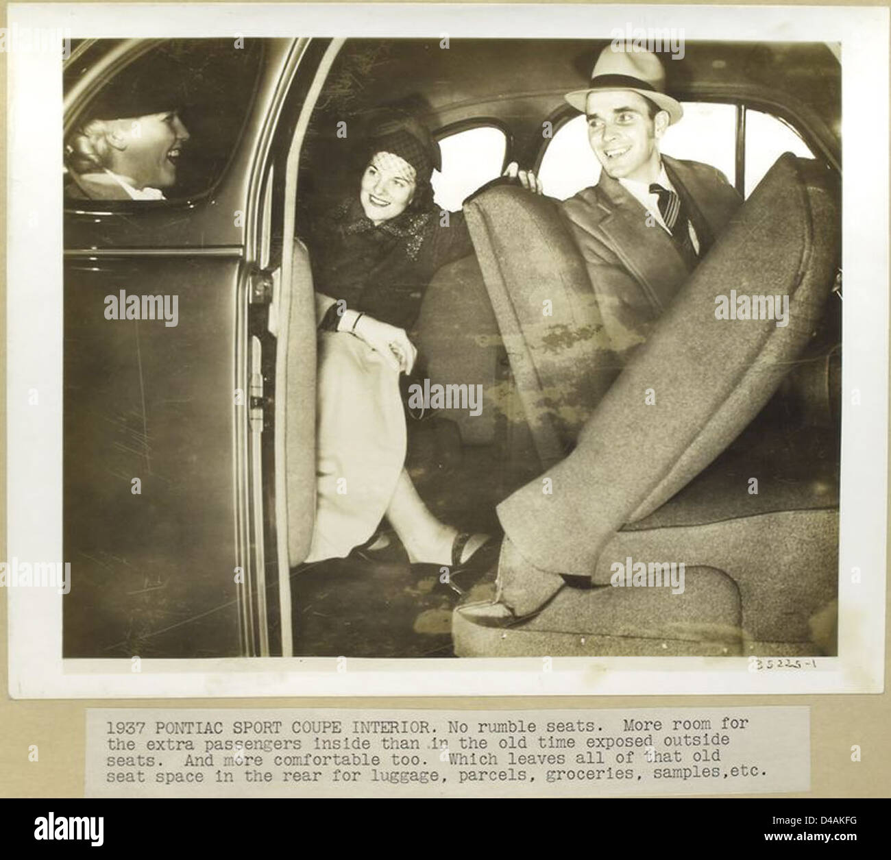 This image presents the interior of a 1937 Pontiac Sport Coupe ...