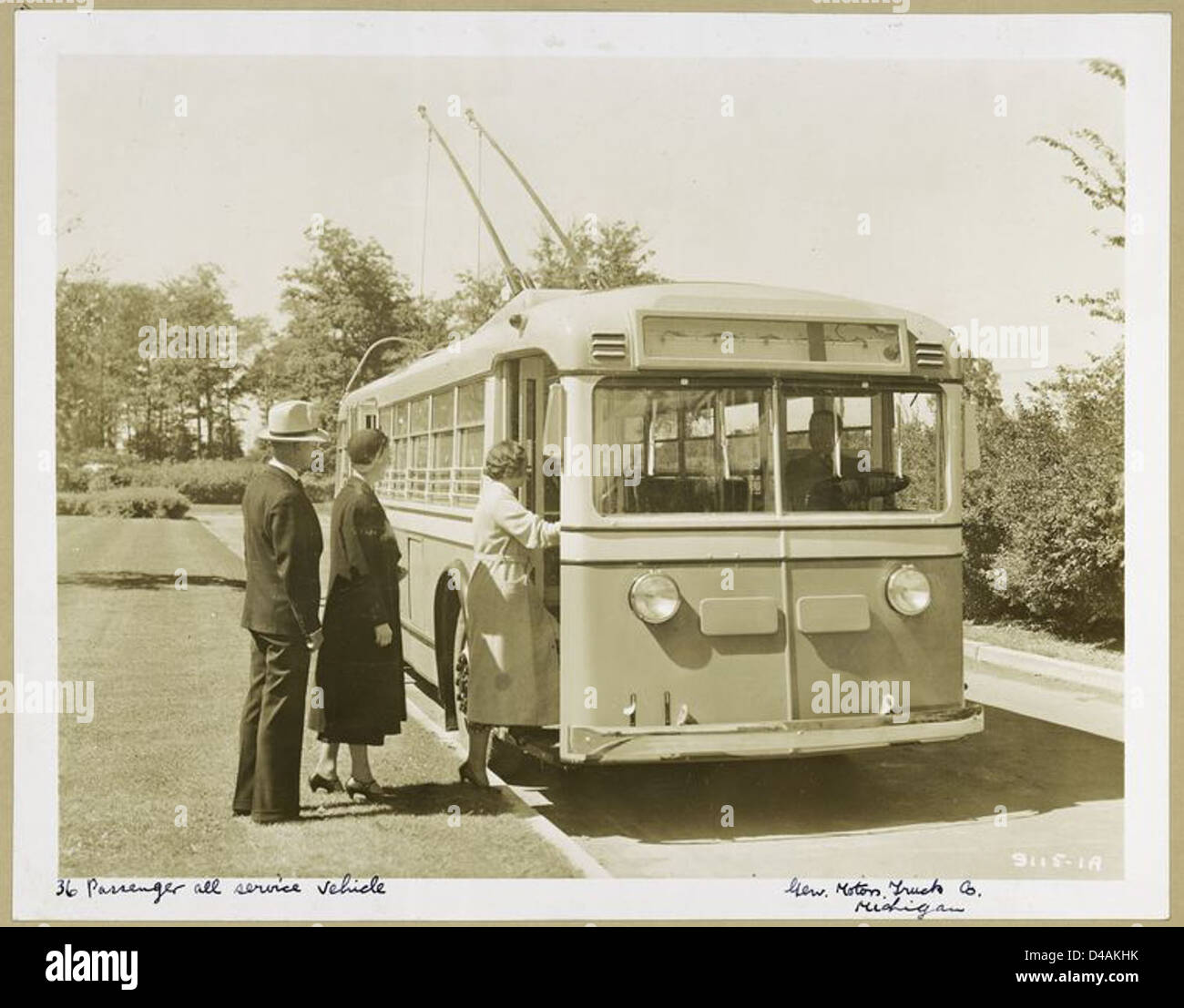 This 1910s photograph shows passengers boarding a General Motors 36 ...