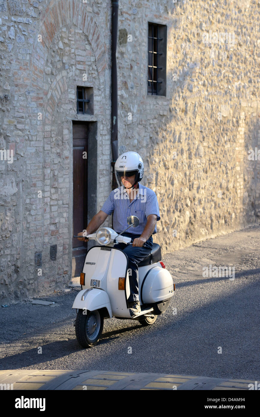 Man on italian vespa scooter hi-res stock photography and images - Alamy
