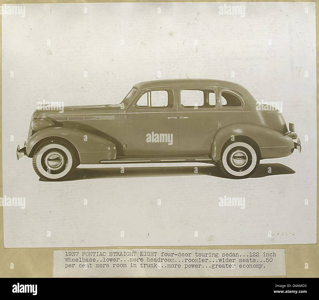 This photograph shows the 1937 Pontiac Straight Eight, a four-door ...