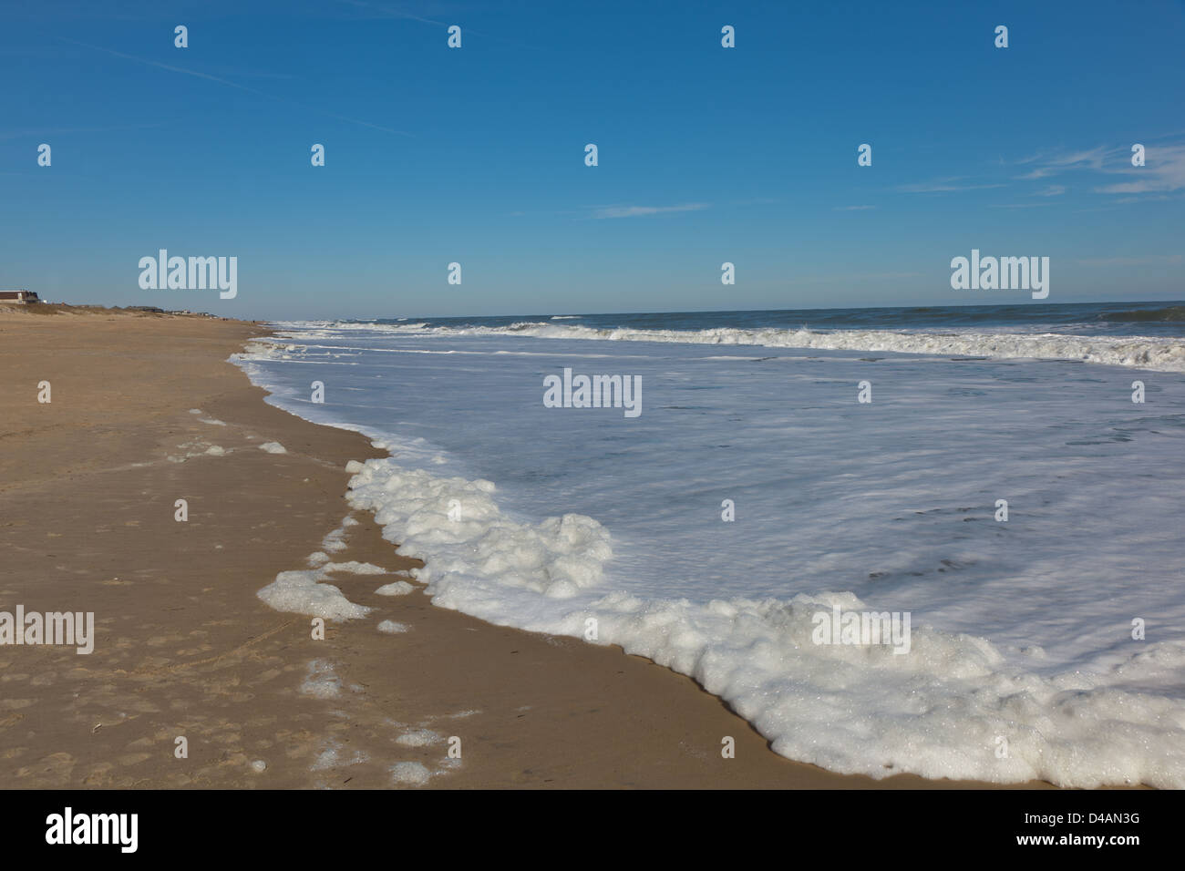 Waves receding from a beach in North Carolina Stock Photo - Alamy