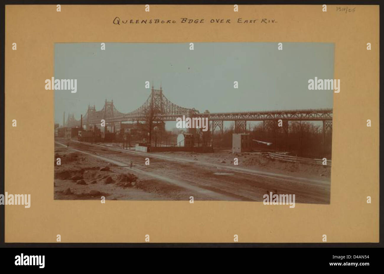 A photograph of the Queensboro Bridge, spanning the East River in New ...
