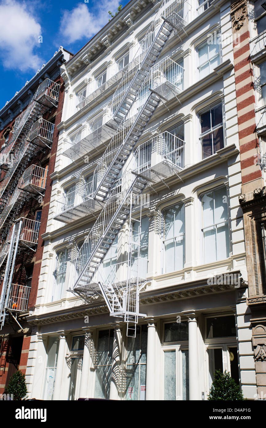 Fire escape ladders on the building in Manhattan Stock Photo - Alamy
