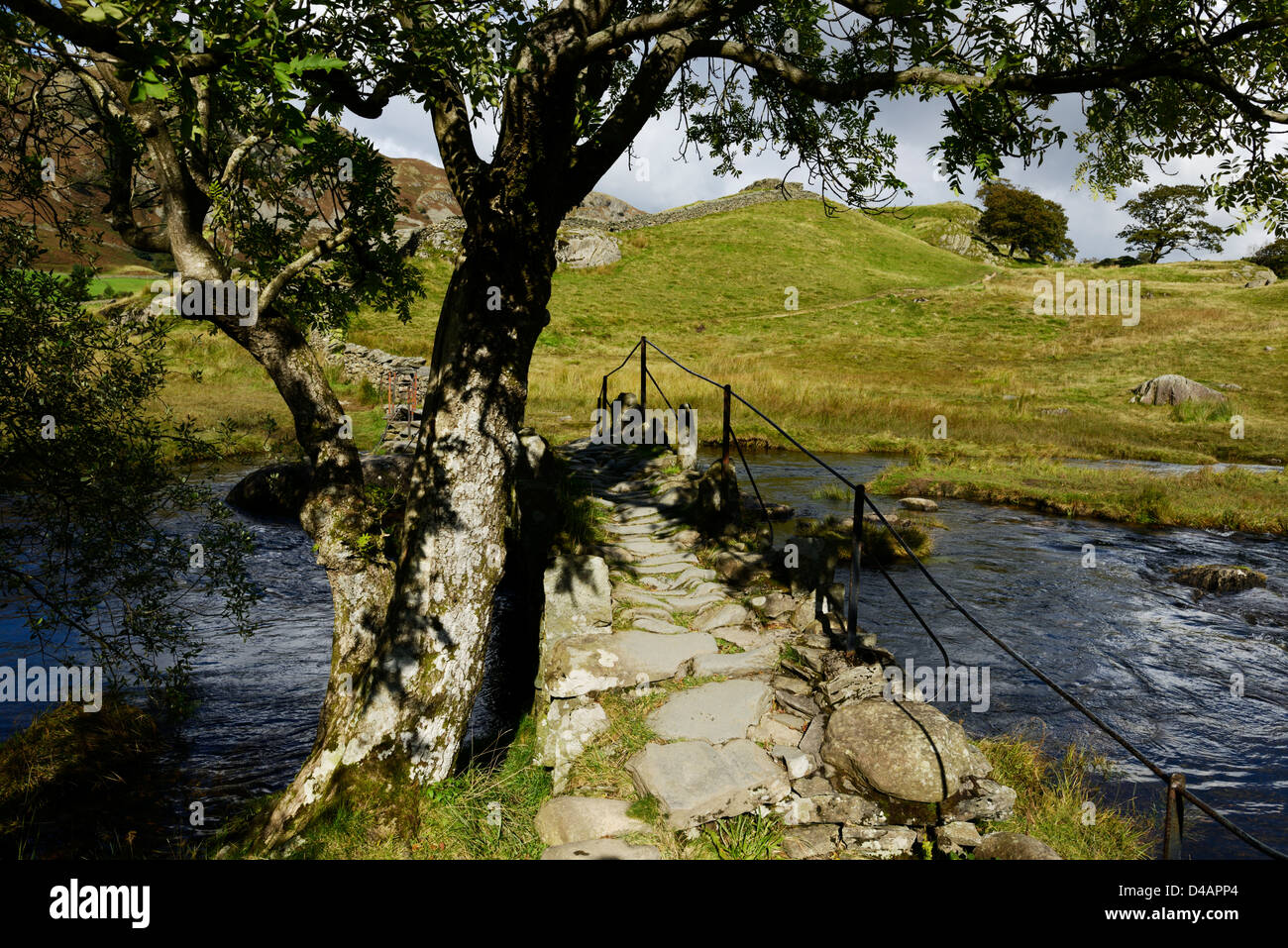 Typical packhorse bridge spanning the river brathay hi-res stock ...