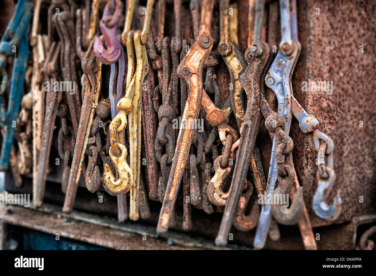 Rusty old load binders hanging from rusted storage bin in Sitka, Alaska ...