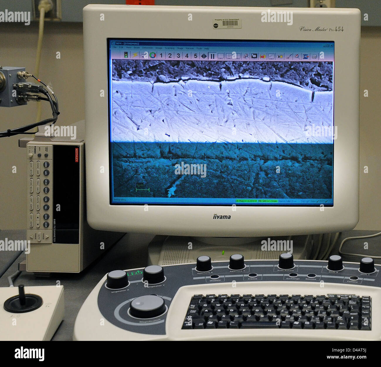 A piece of film from the Echo II project is analyzed in NASA’s ...