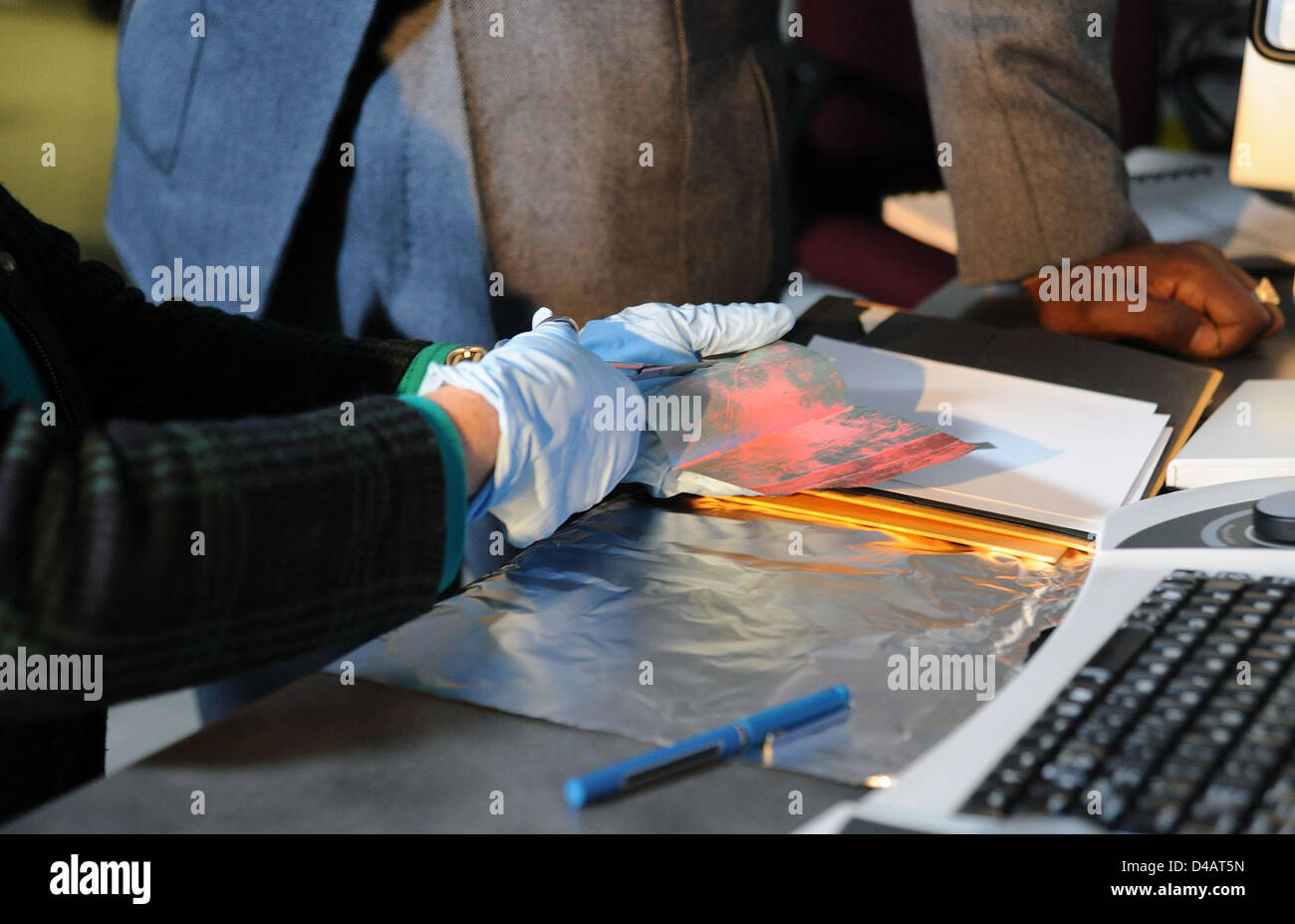 NASA scientist Debbie Thomas prepared samples for testing during a ...