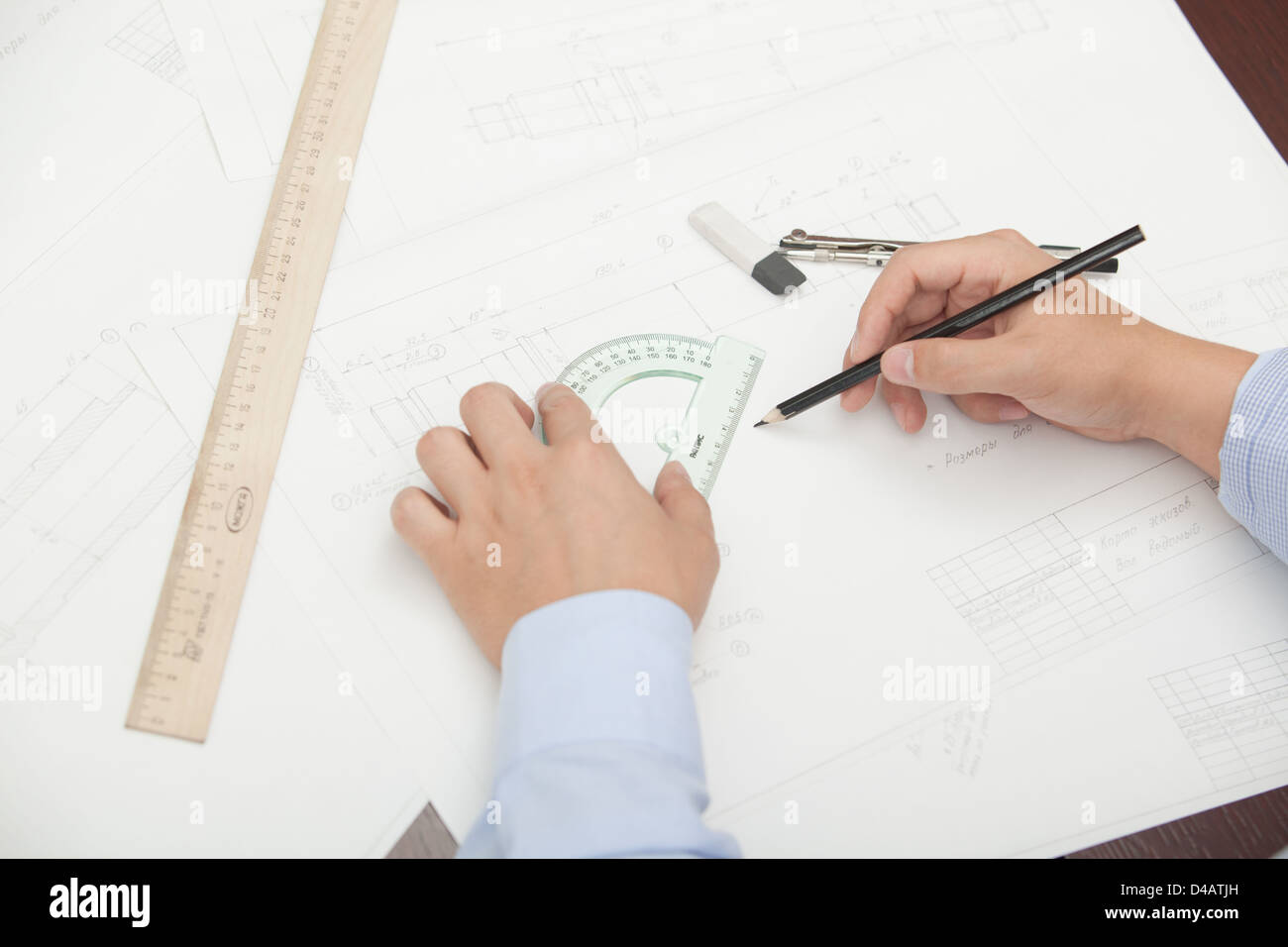 Hands male architect to make drawings using various line pencil and ...