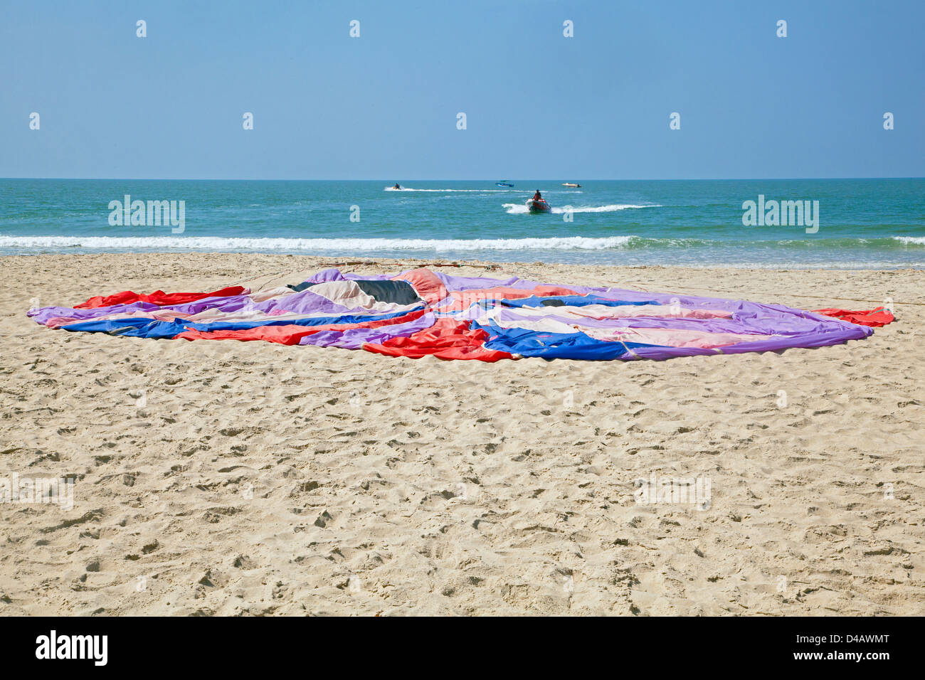 Generic beach landscape of seaside activity and sports of parachute ...