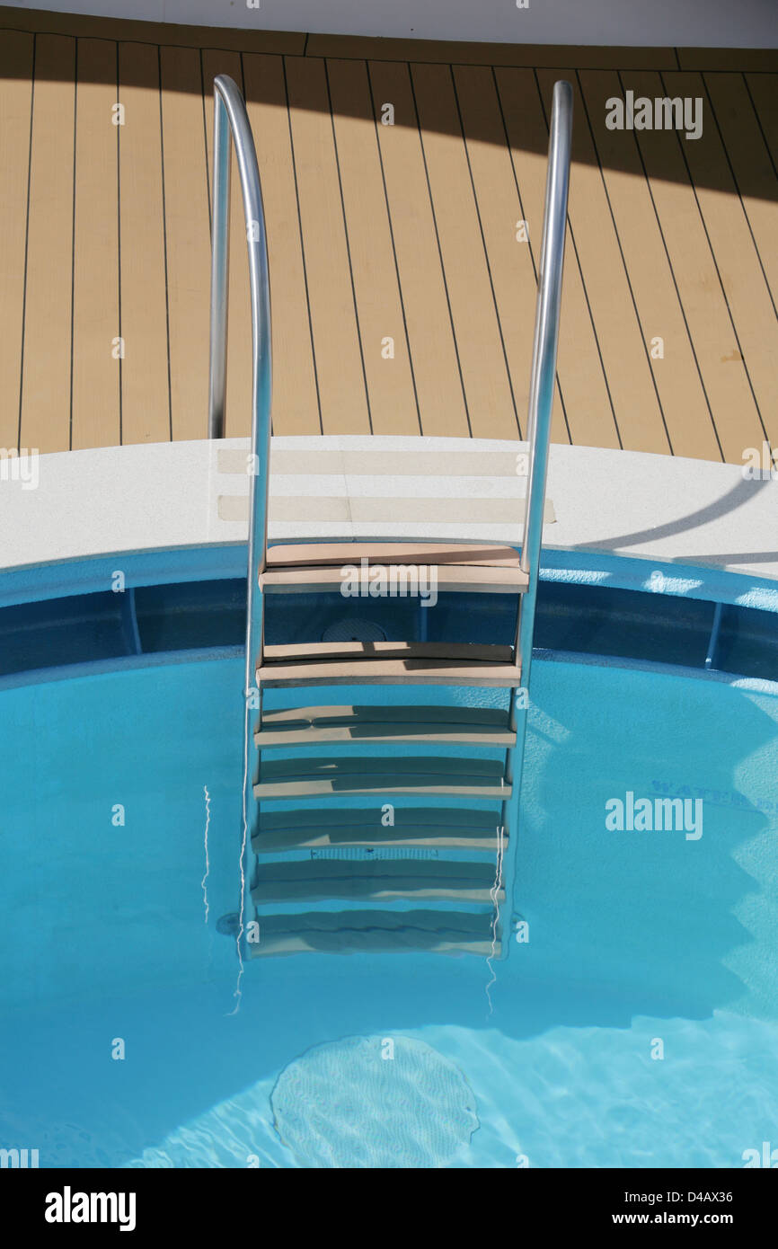 Pool ladder and swimming pool Stock Photo - Alamy