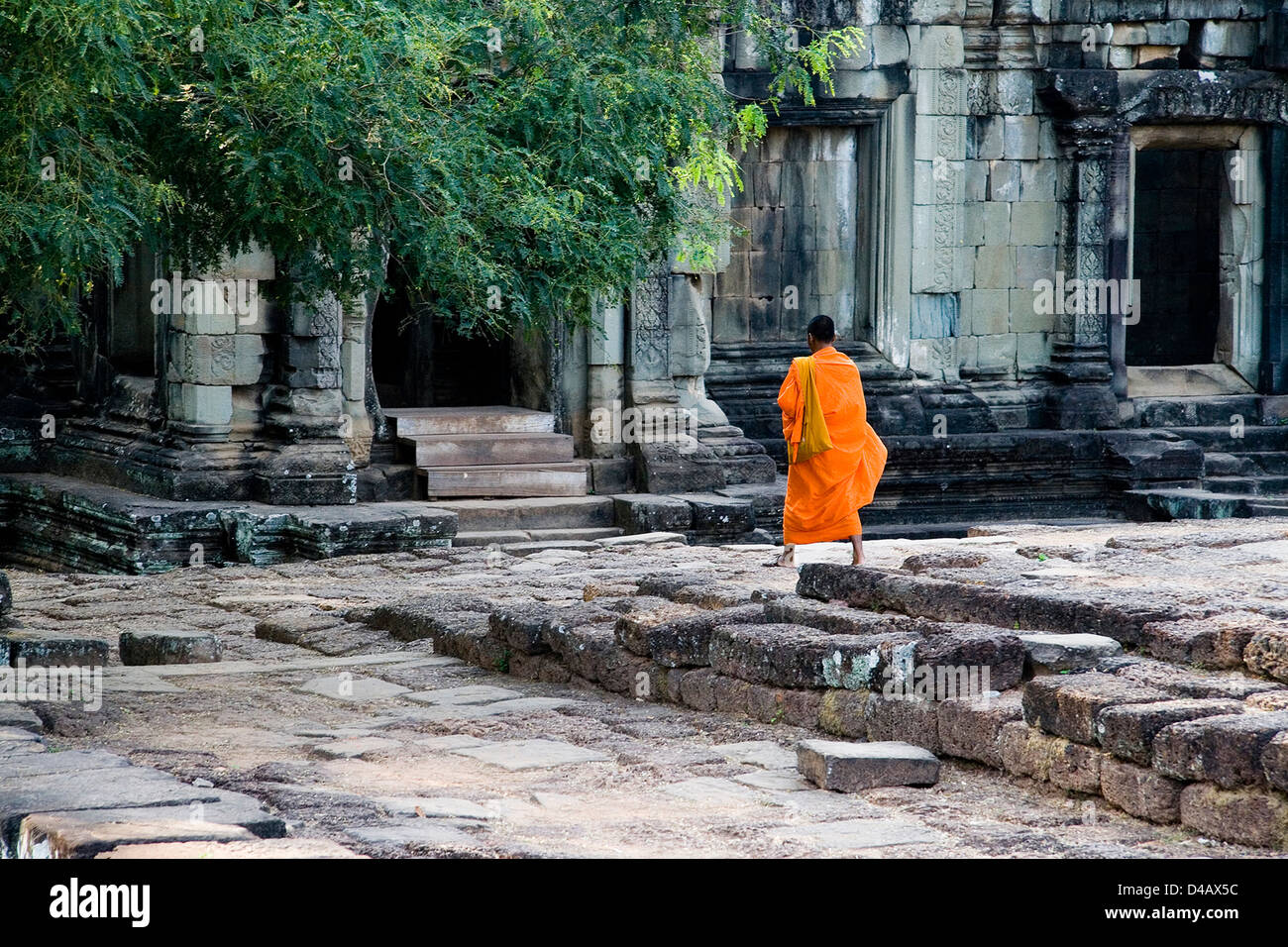 Monk entering temple to pray Stock Photo - Alamy