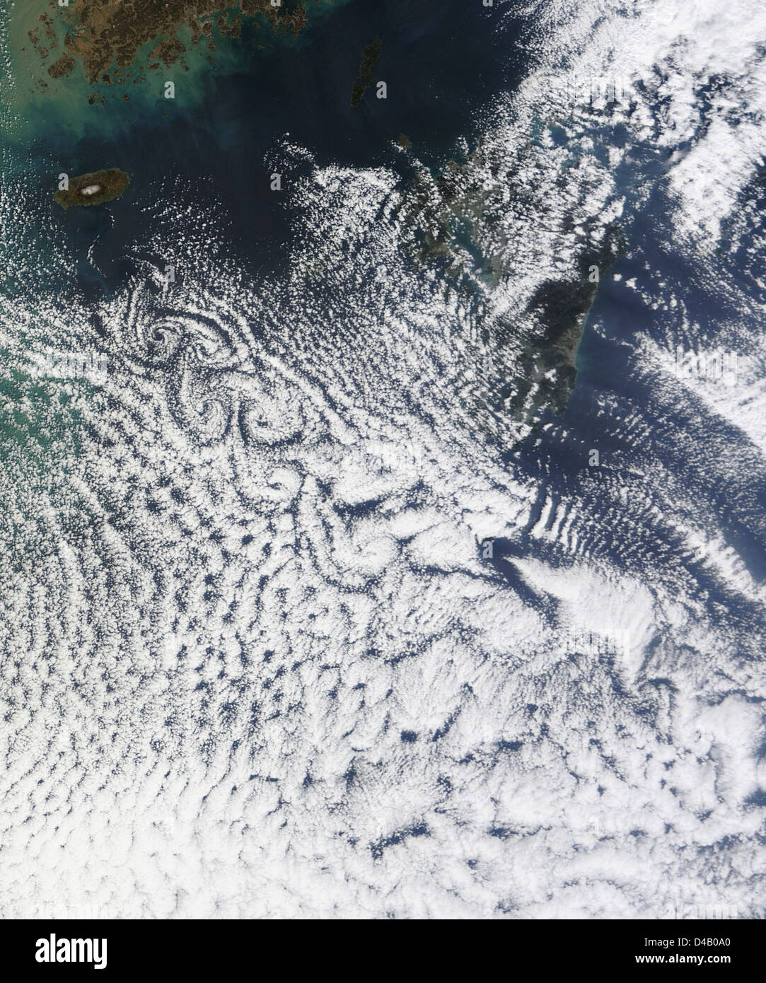 Cloud vortices are observed off Cheju Do, South Korea, captured by a ...