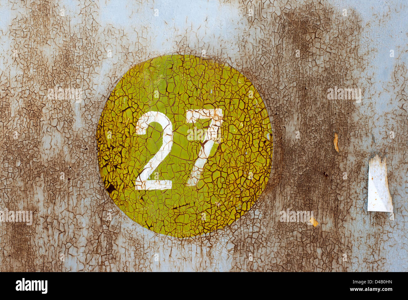 numbers on the old rusty metal wall Stock Photo - Alamy