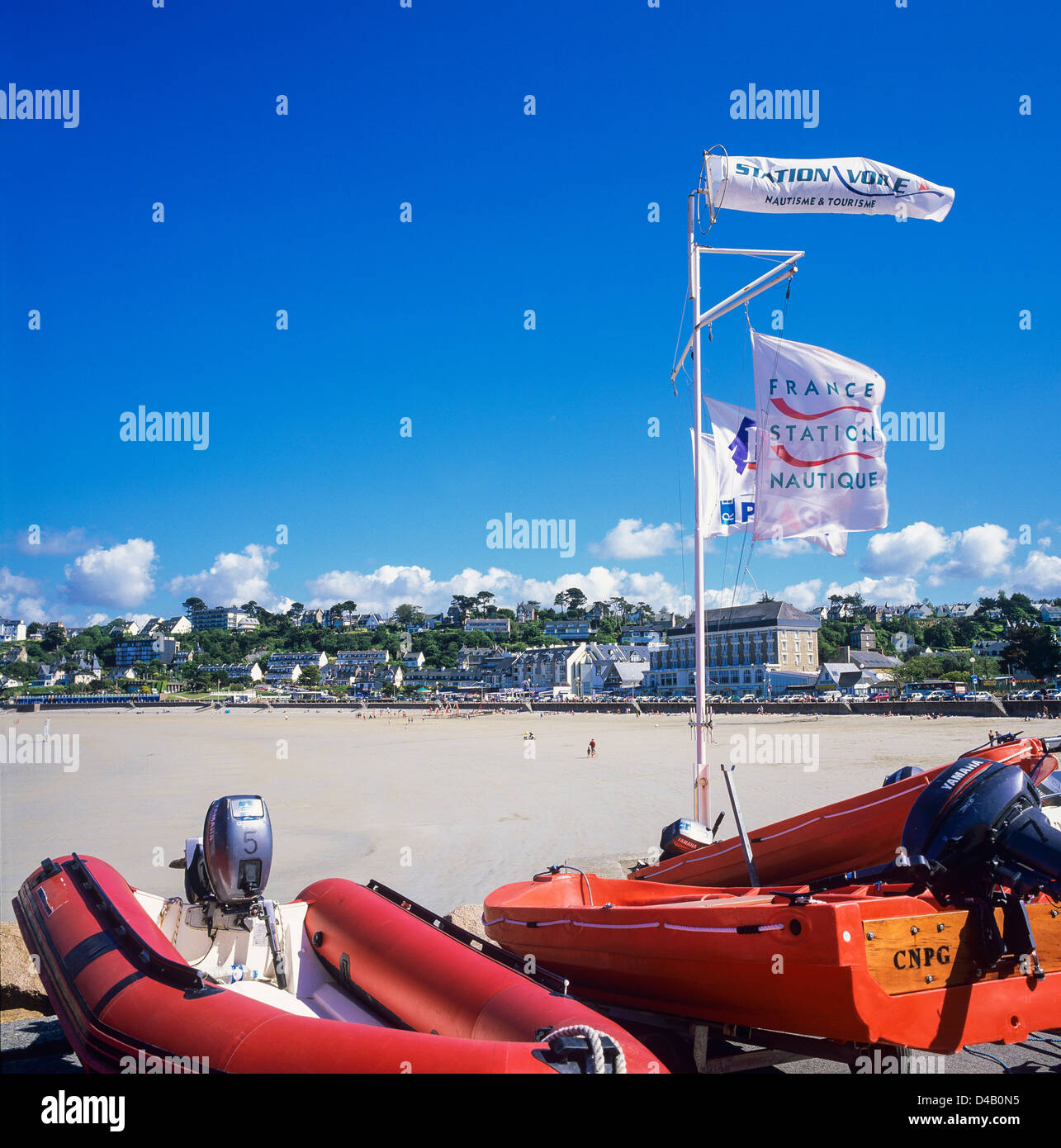 Red boats on beach and town "Perros-Guirec" Brittany France Stock Photo ...