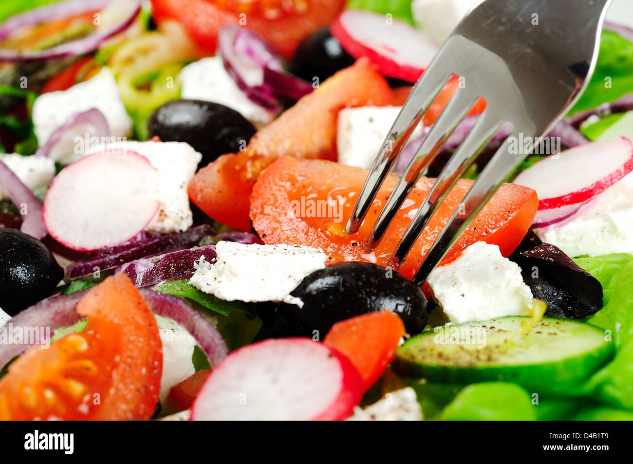 Closeup of salad and fork Stock Photo - Alamy