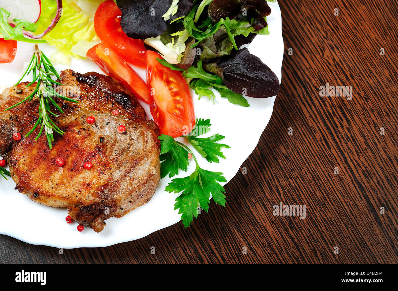 Plate with salad and meat Stock Photo - Alamy