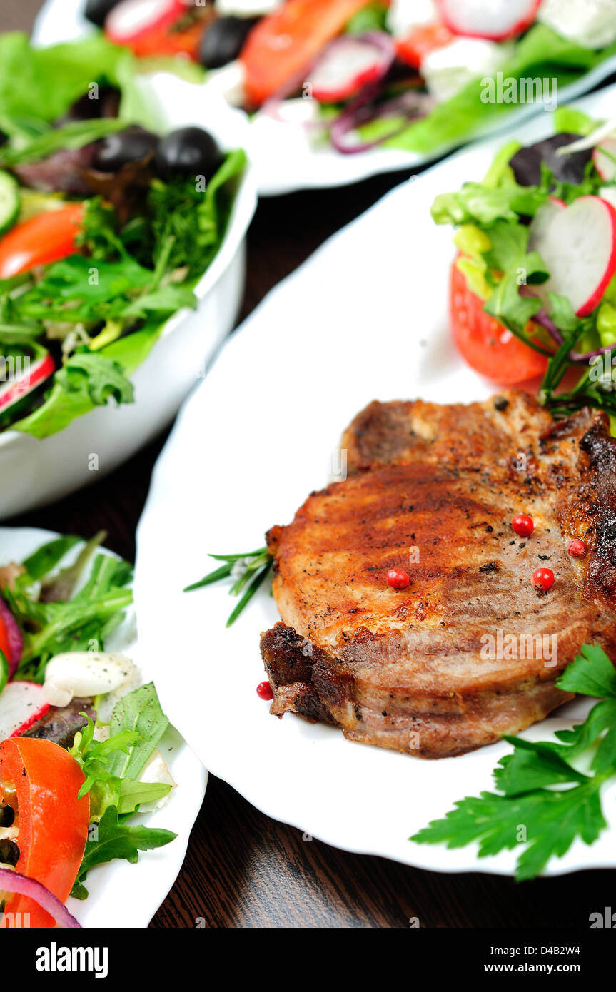 Plate with salad and meat Stock Photo - Alamy