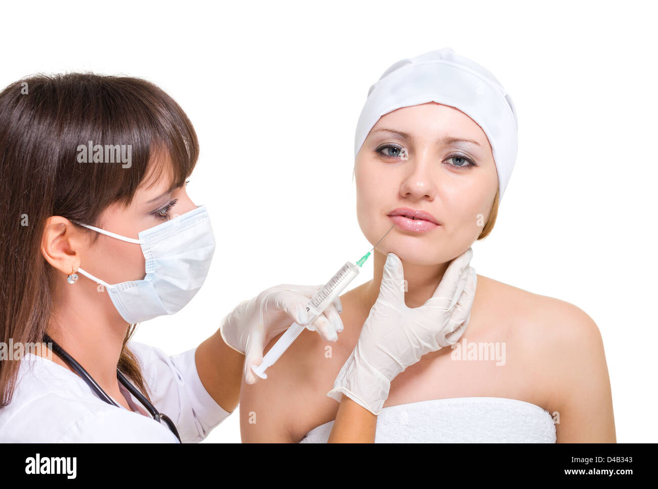 Cosmetic injection to the pretty female face Stock Photo - Alamy