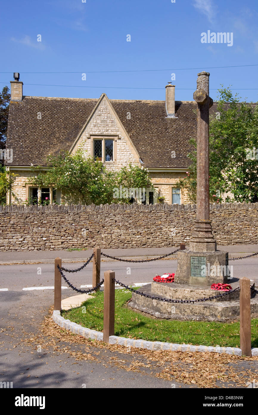 A small village war memorial in Kemble in The Cotswolds, UK Stock Photo ...