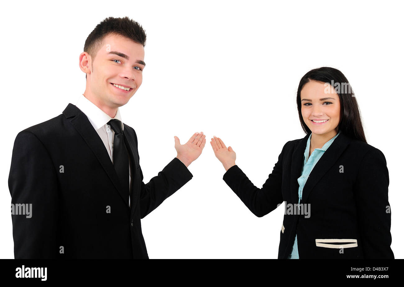 Isolated young business couple showing Stock Photo - Alamy