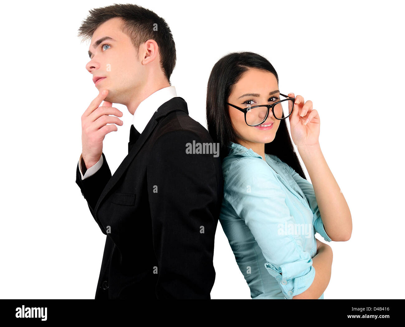 Isolated young business couple standing Stock Photo - Alamy