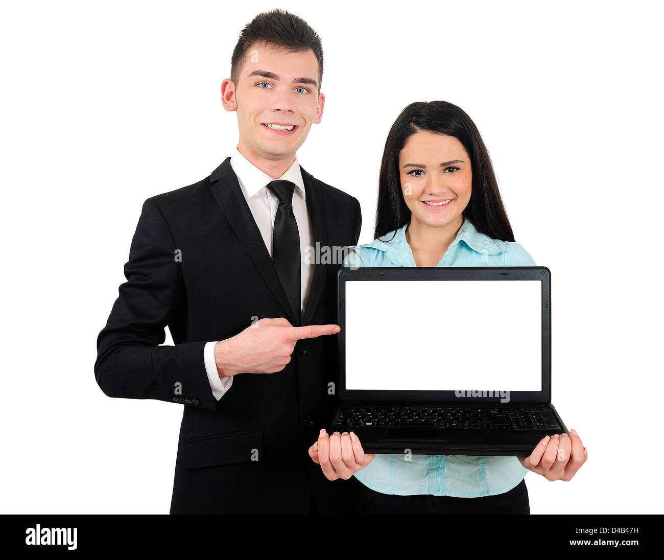 Isolated young business couple showing laptop Stock Photo - Alamy