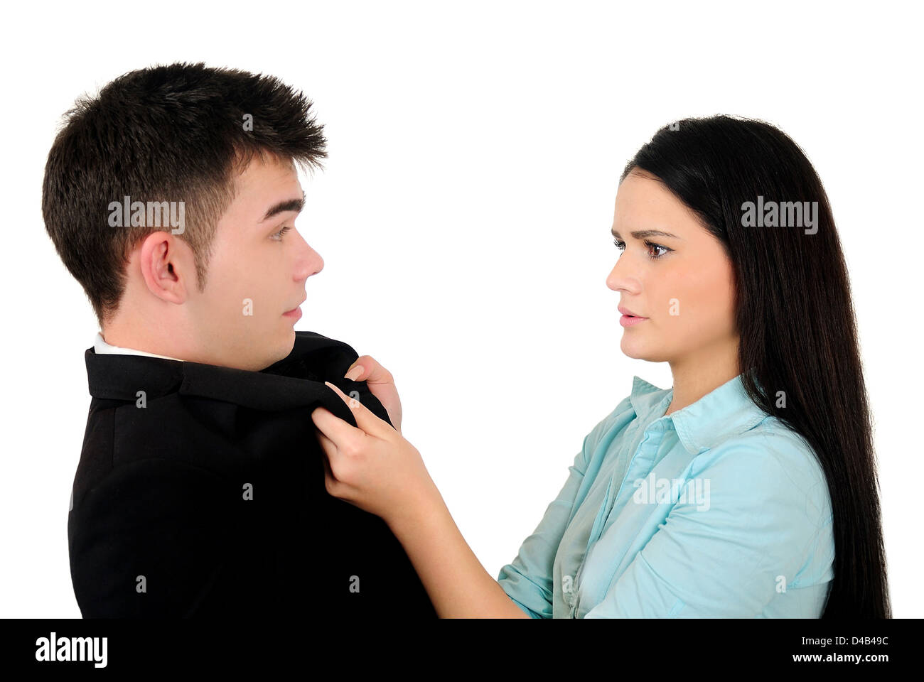 Isolated young business couple argue Stock Photo - Alamy