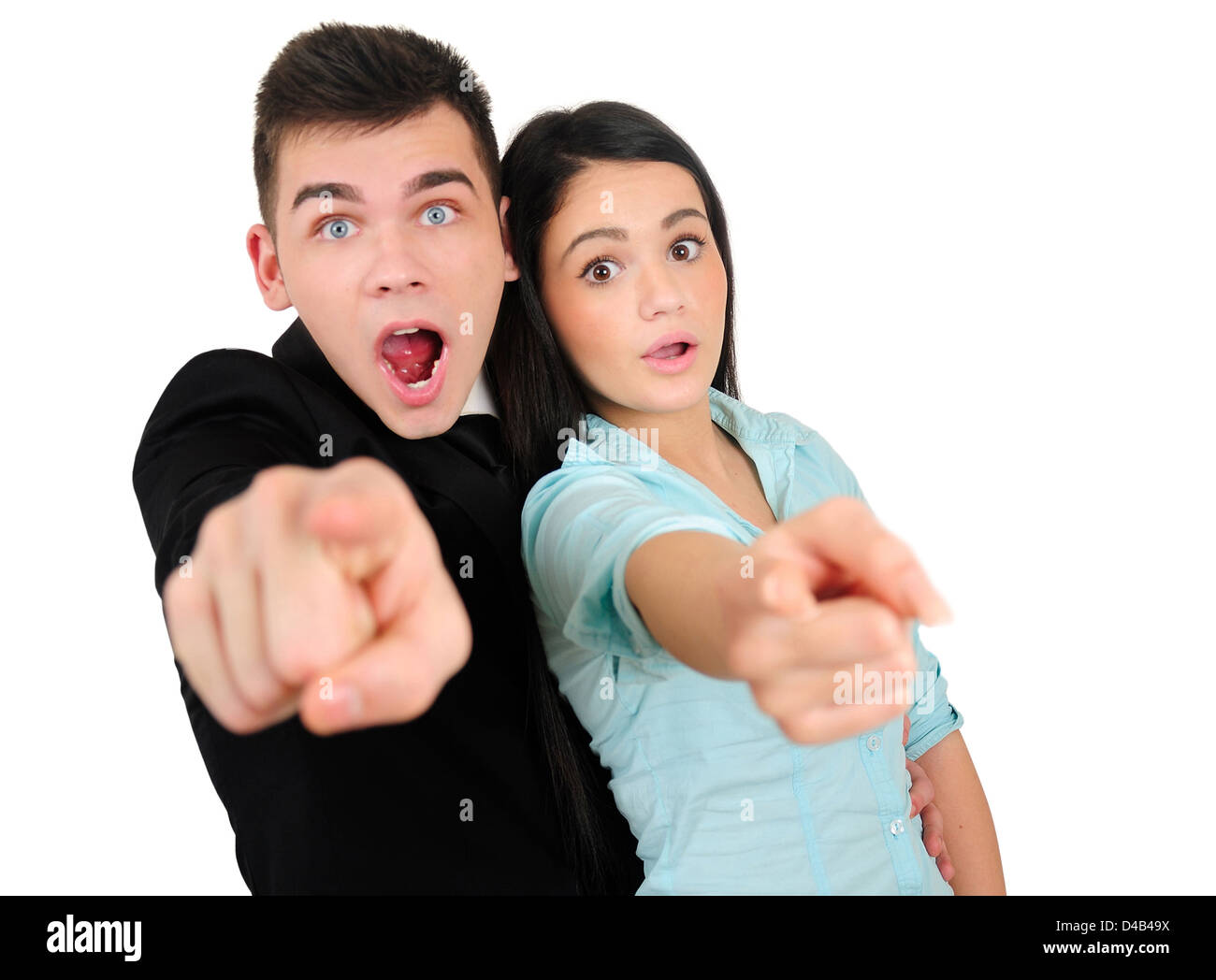 Isolated young business couple pointing Stock Photo - Alamy